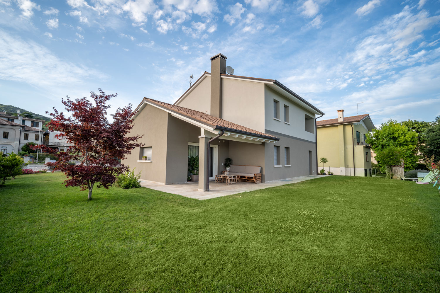 Rivestimento esterno per villa privata acrilsilossanico effetto intonachino